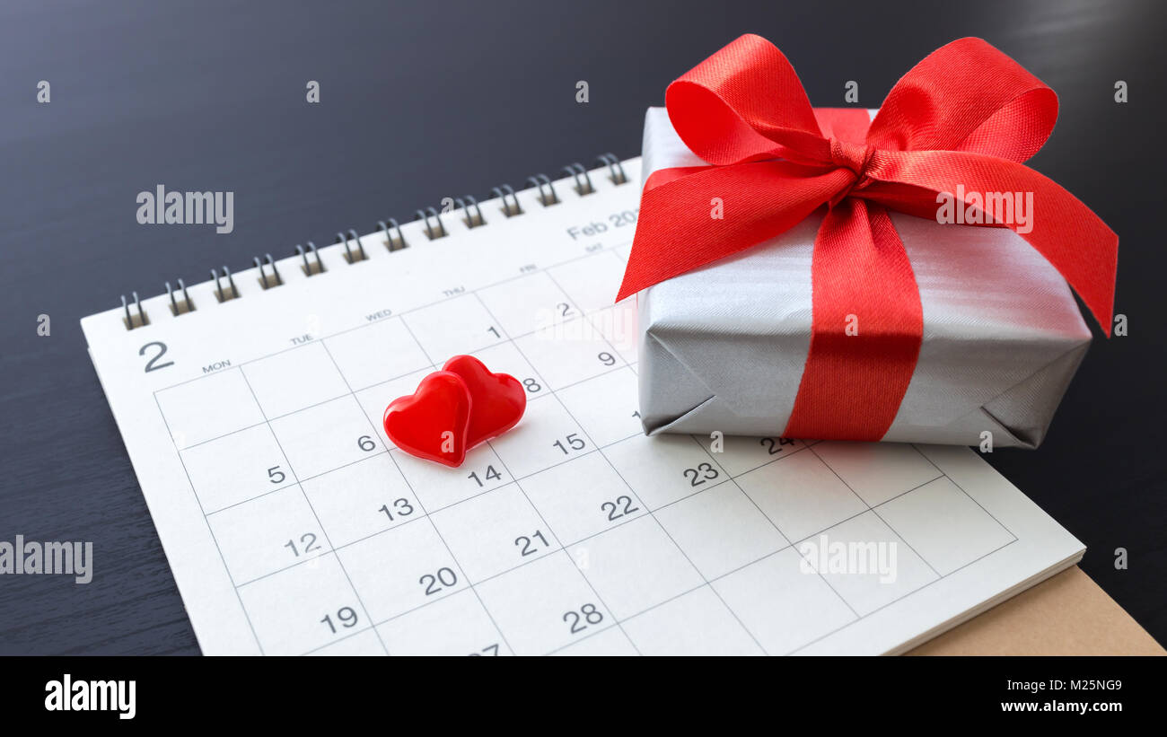Hearts on calendar February 14 with gift box for valentines day Stock ...
