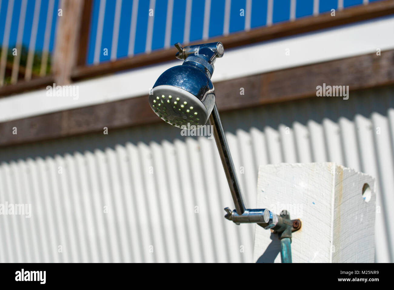 An outside fresh water shower for use by swimmers as they leave the ...