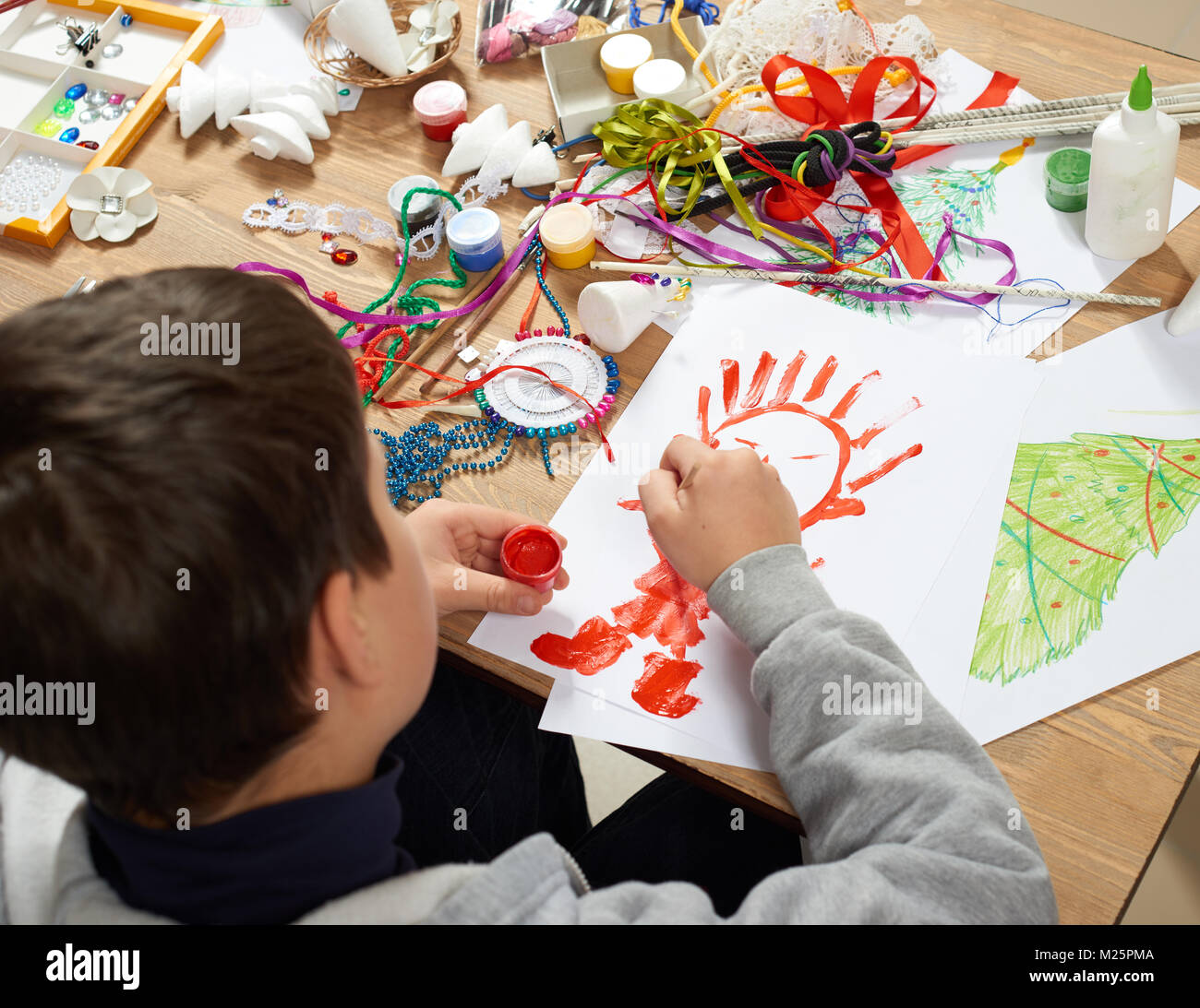 Child make crafts and toys, handmade concept. Artwork workplace with ...