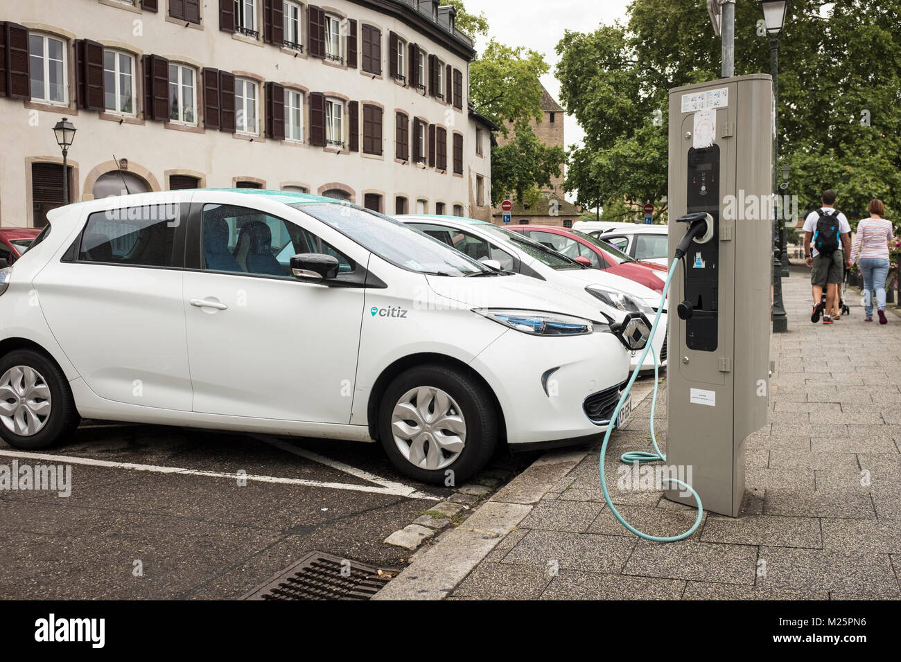 Electric Citiz car sharing vehicle at a charging station in the old ...