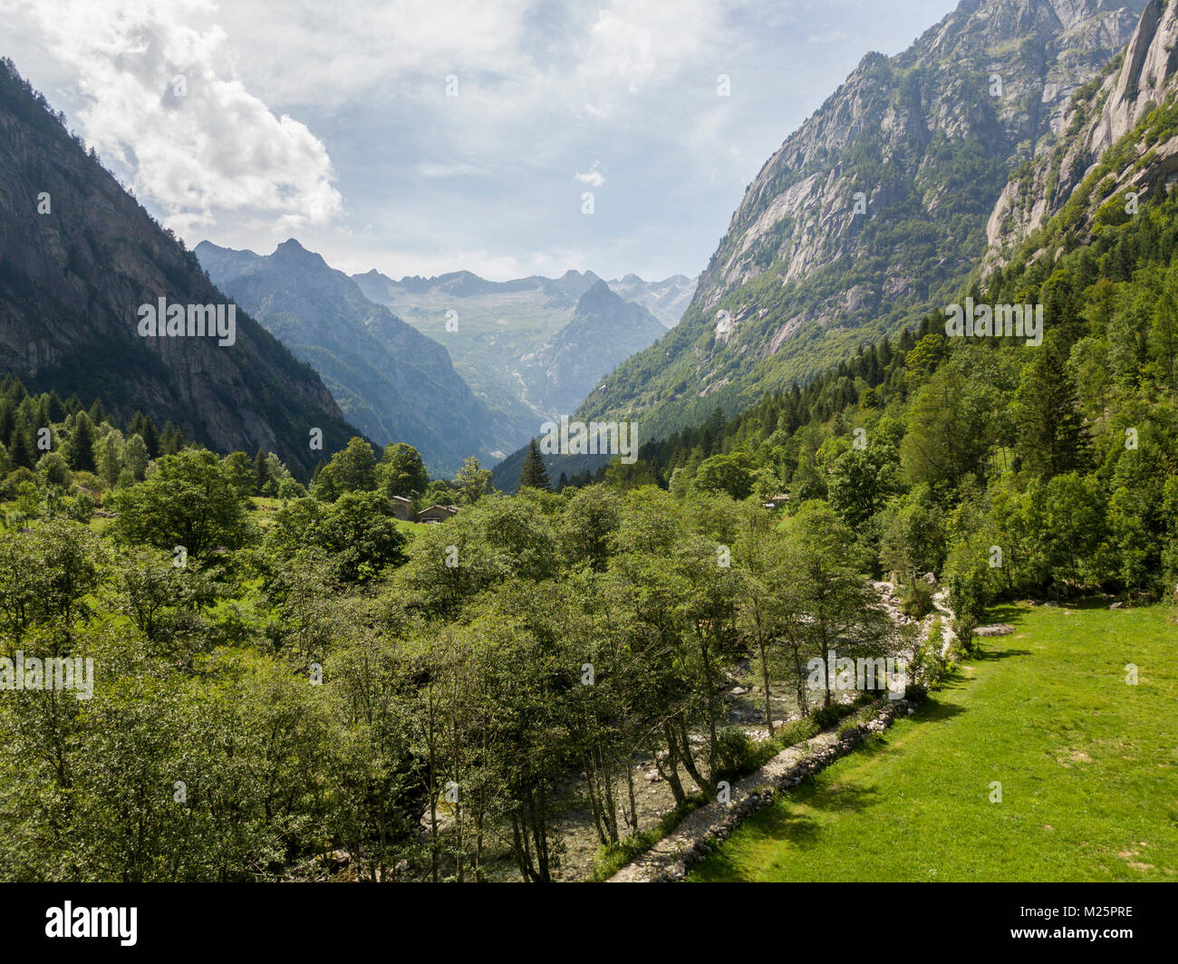 Aerial view of the Mello Valley, Val di Mello, a green valley with ...