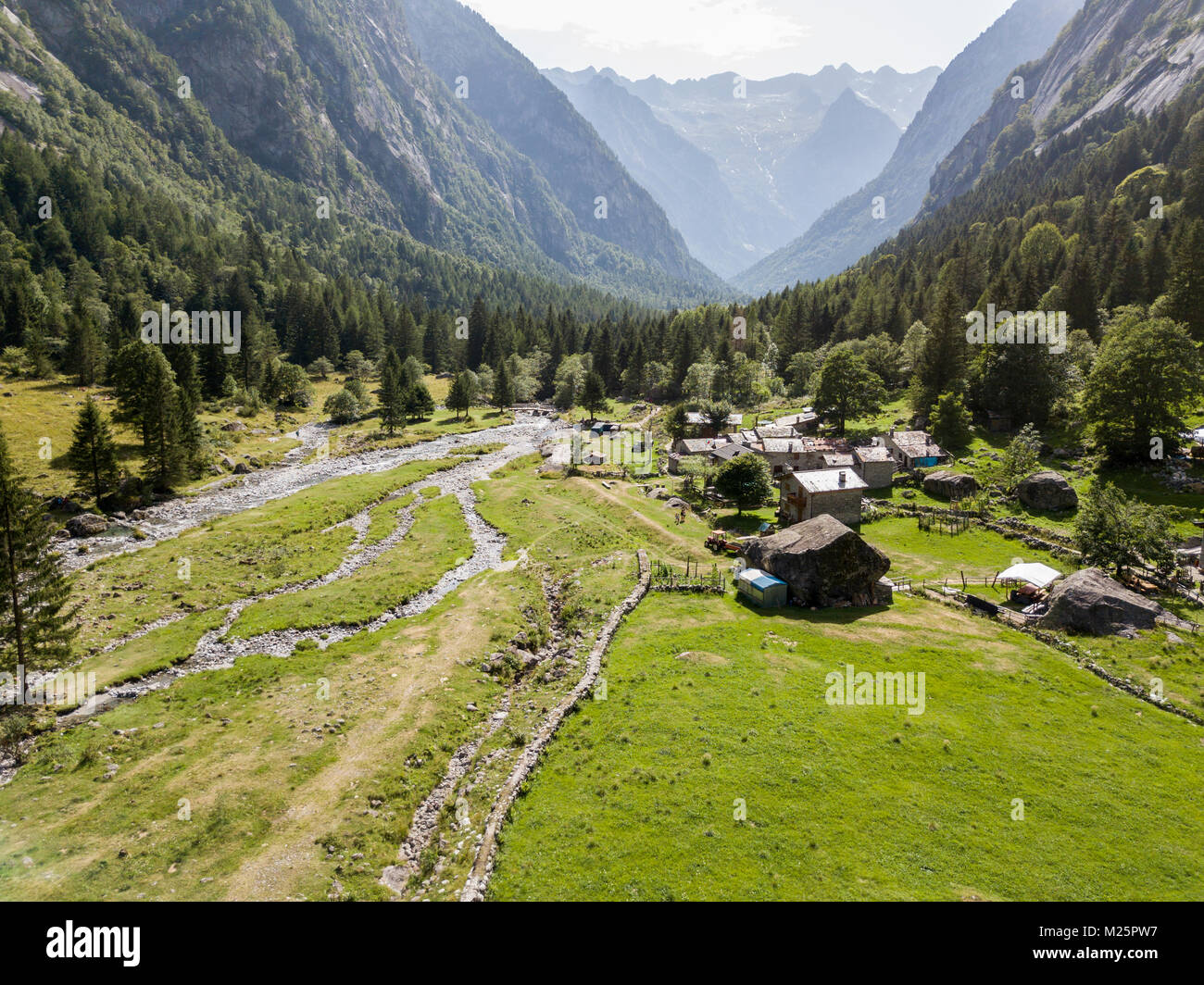 Aerial view of the Mello Valley, Val di Mello, a green valley with ...