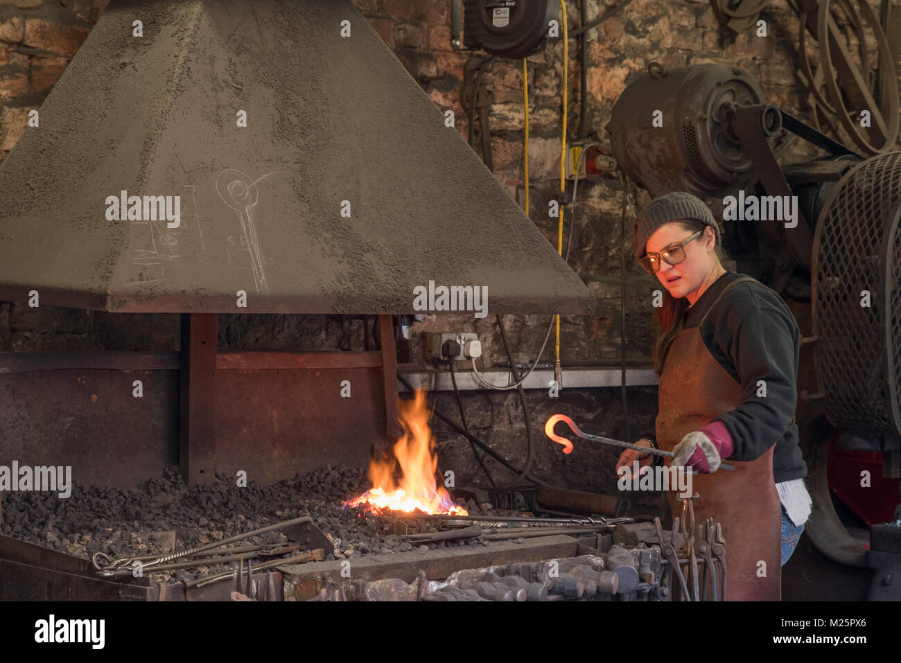 Female Blacksmith Work High Resolution Stock Photography and Images - Alamy