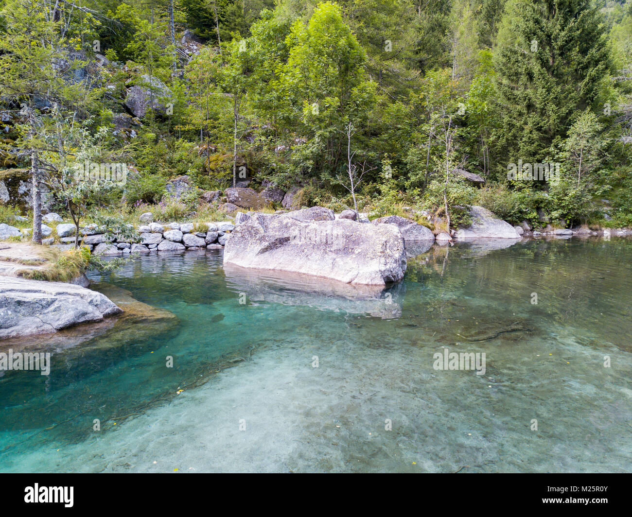 Aerial view of the Mello Valley, Val di Mello, a green valley with ...