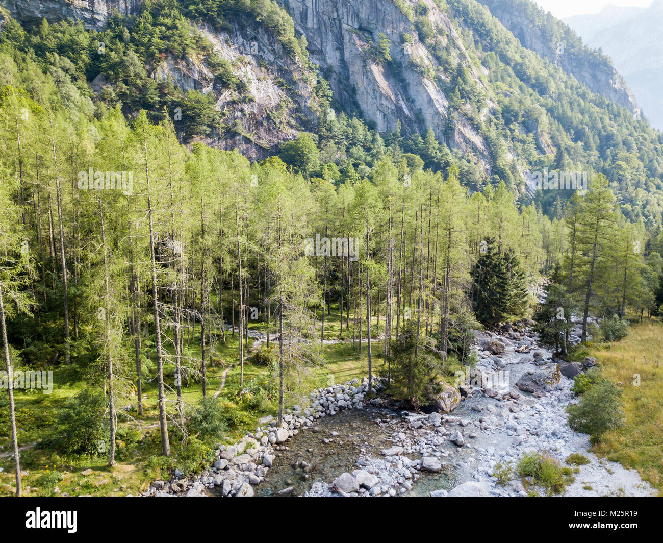 Aerial view of the Mello Valley, Val di Mello, a green valley with ...
