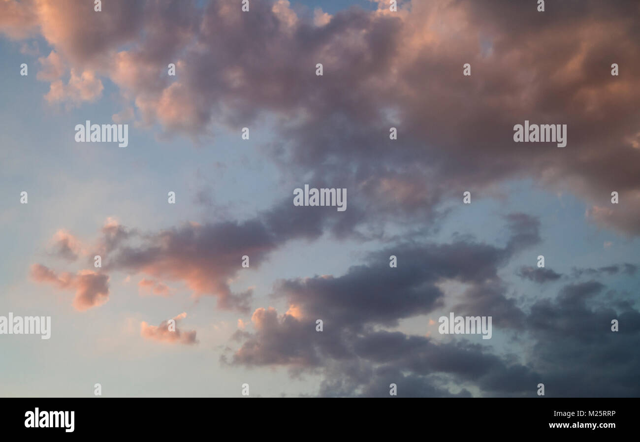 Sky with clouds and sunlight at sunset. colorful and cheerful ...