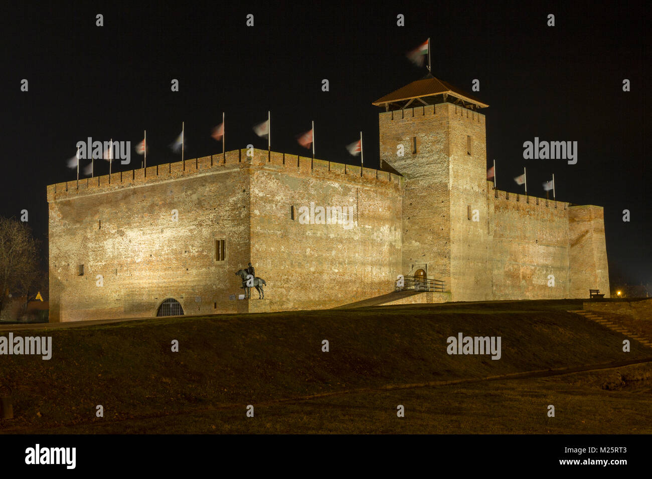 Gyula castle by night in Gyula, Hungary Stock Photo - Alamy
