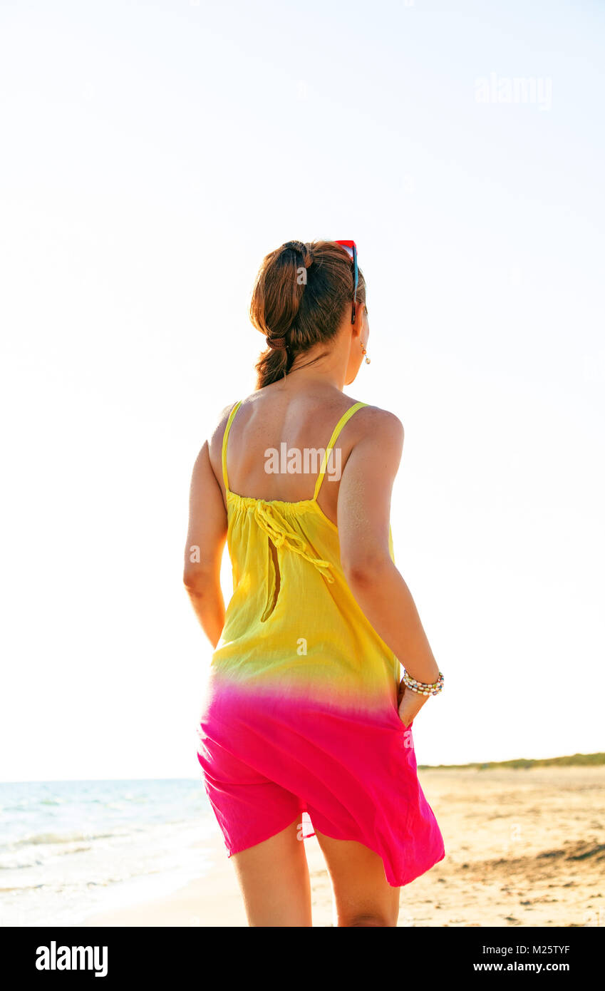 Colorful and wonderfully cheerful mood. young woman in colorful dress ...