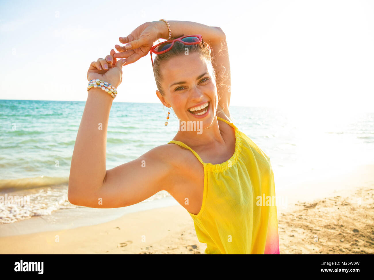 Colorful and wonderfully cheerful mood. Portrait of cheerful young ...