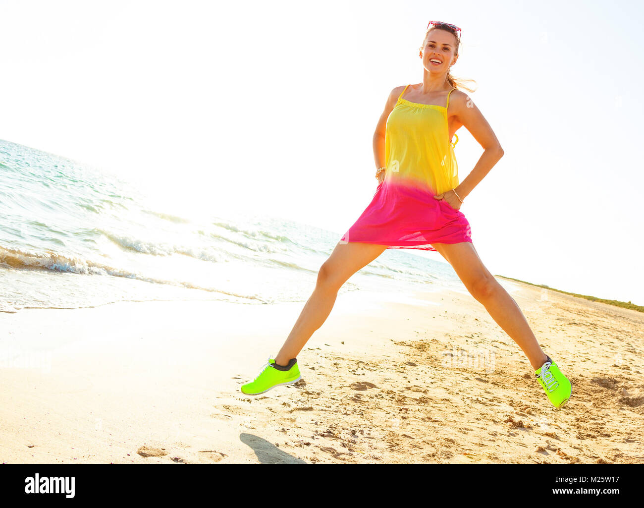 Colorful and wonderfully cheerful mood. Full length portrait of young ...