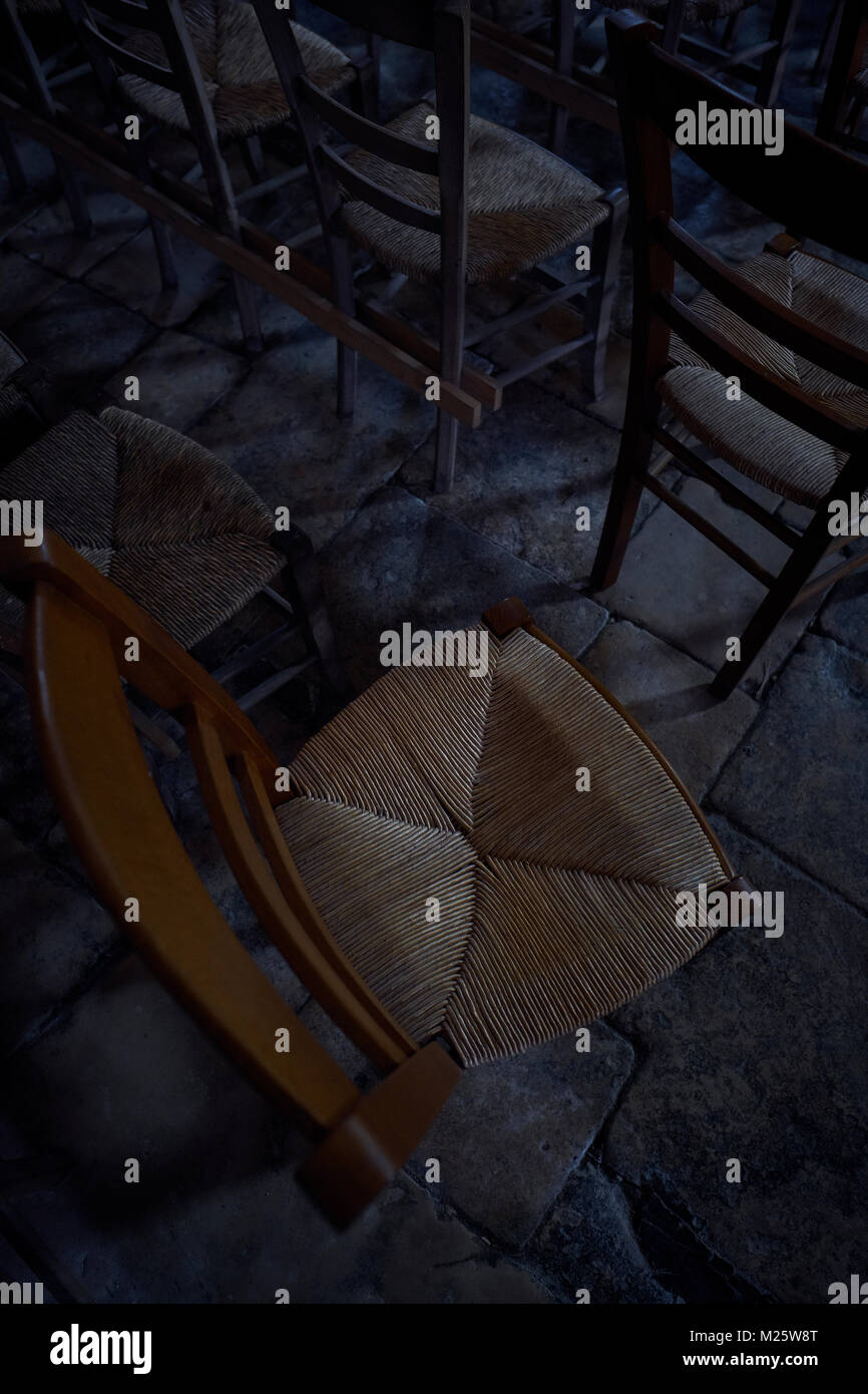 An empty church chair Stock Photo - Alamy