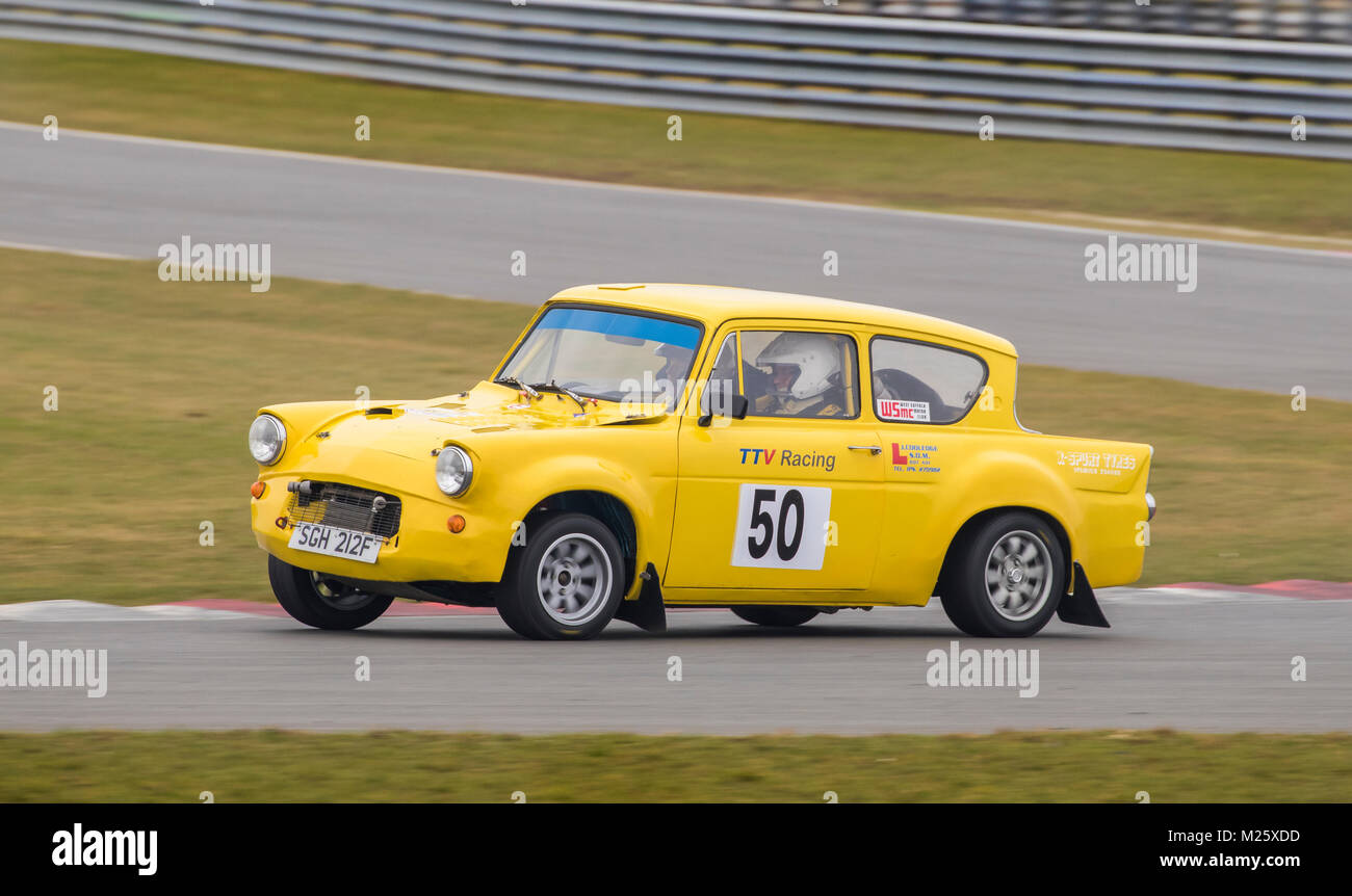 Ford Anglia 105E with driver John Cooledge and co-driver Peter Eaton at ...