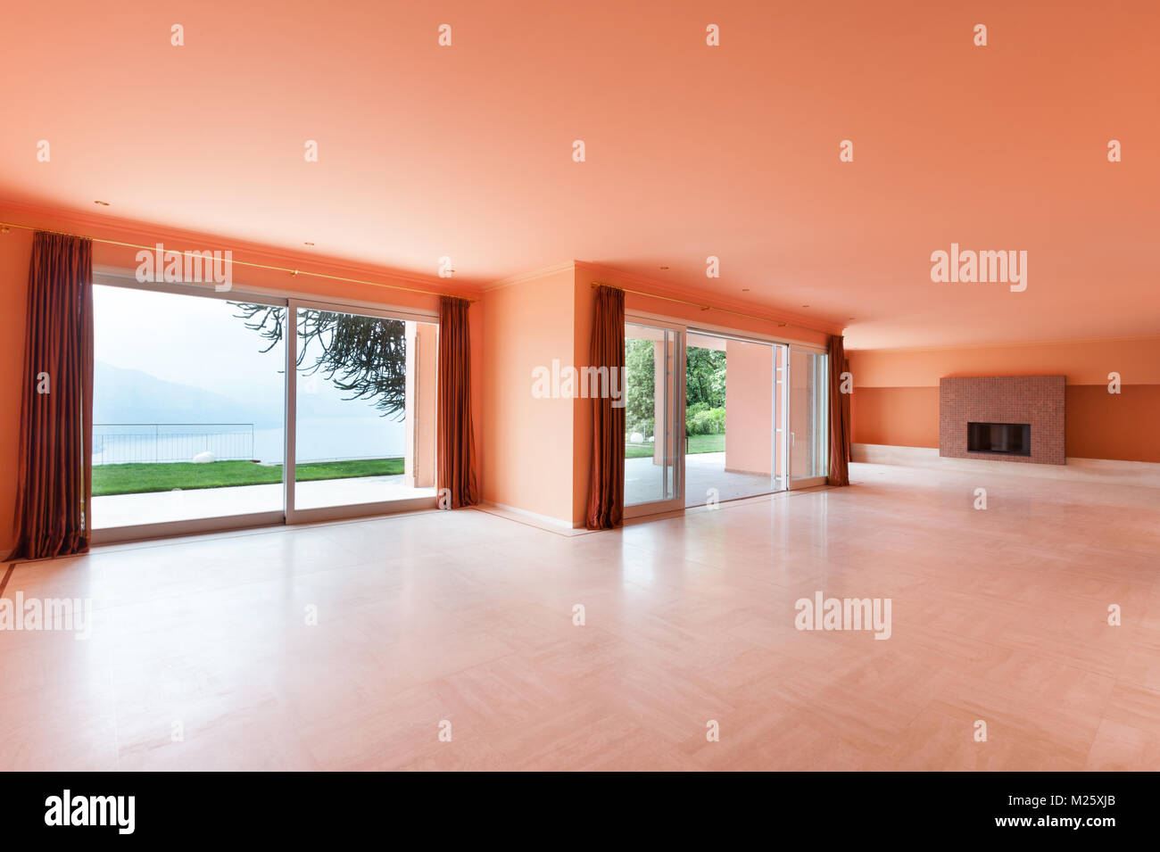 Interior, empty house, wide living room Stock Photo - Alamy