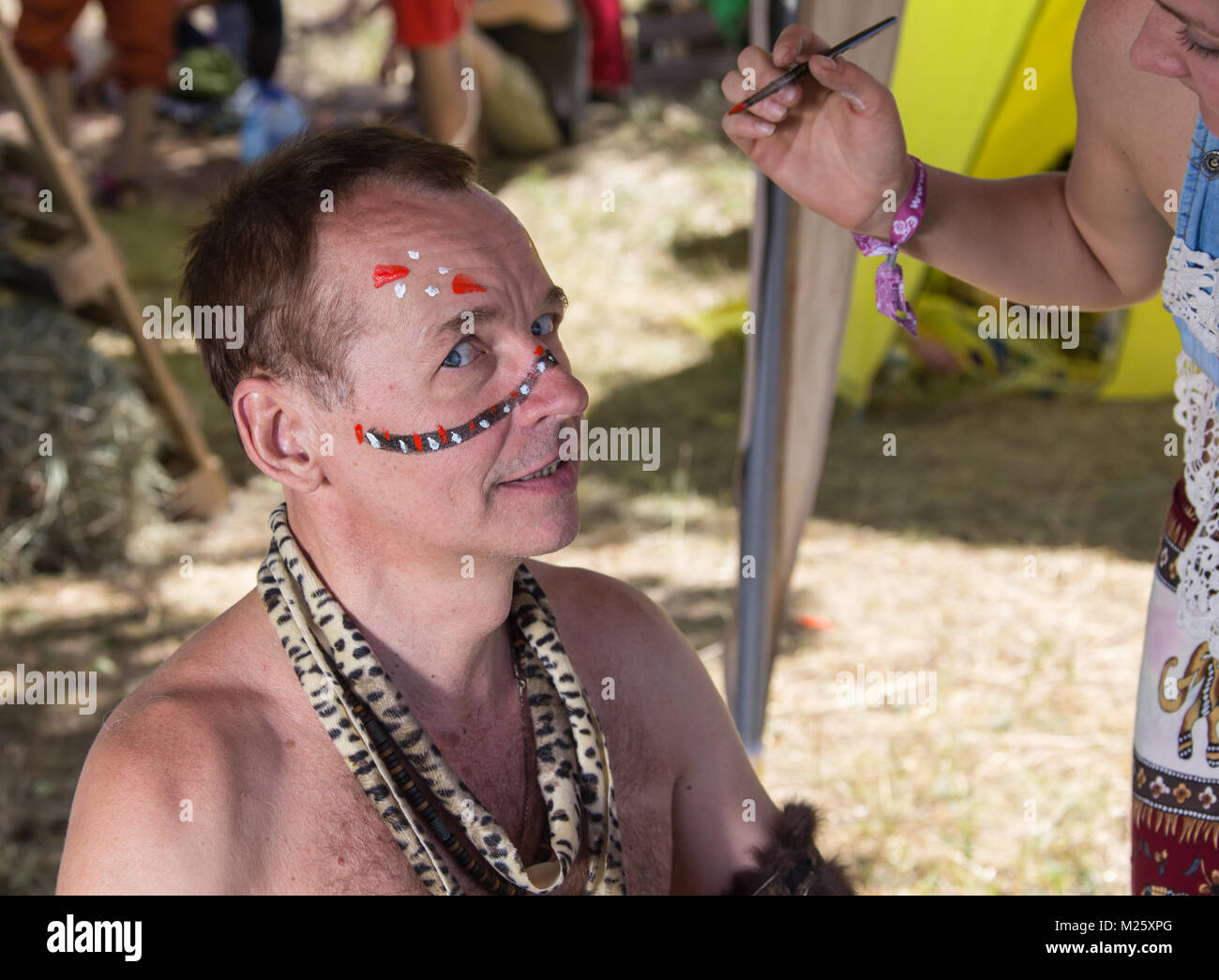 White male dressed in African aborigines Stock Photo - Alamy
