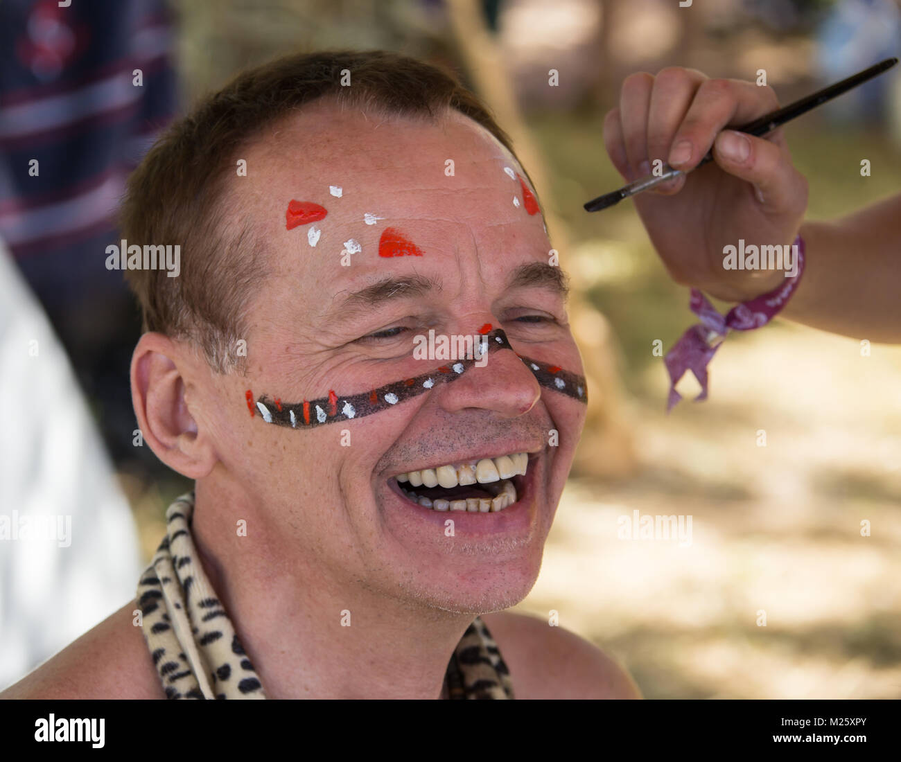 White male dressed in African aborigines Stock Photo - Alamy