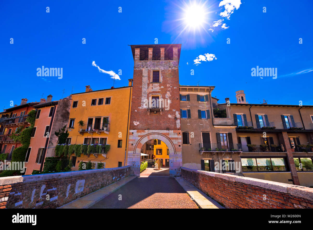 Bridge on Adige river and Verona city gate view, famous landmark in ...