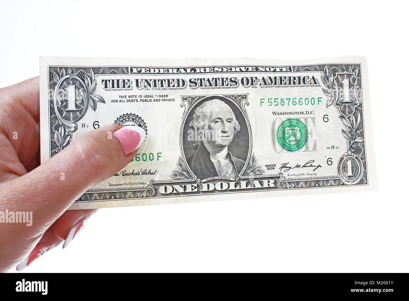 Woman hand holding american one dollar bill on isolated white ...