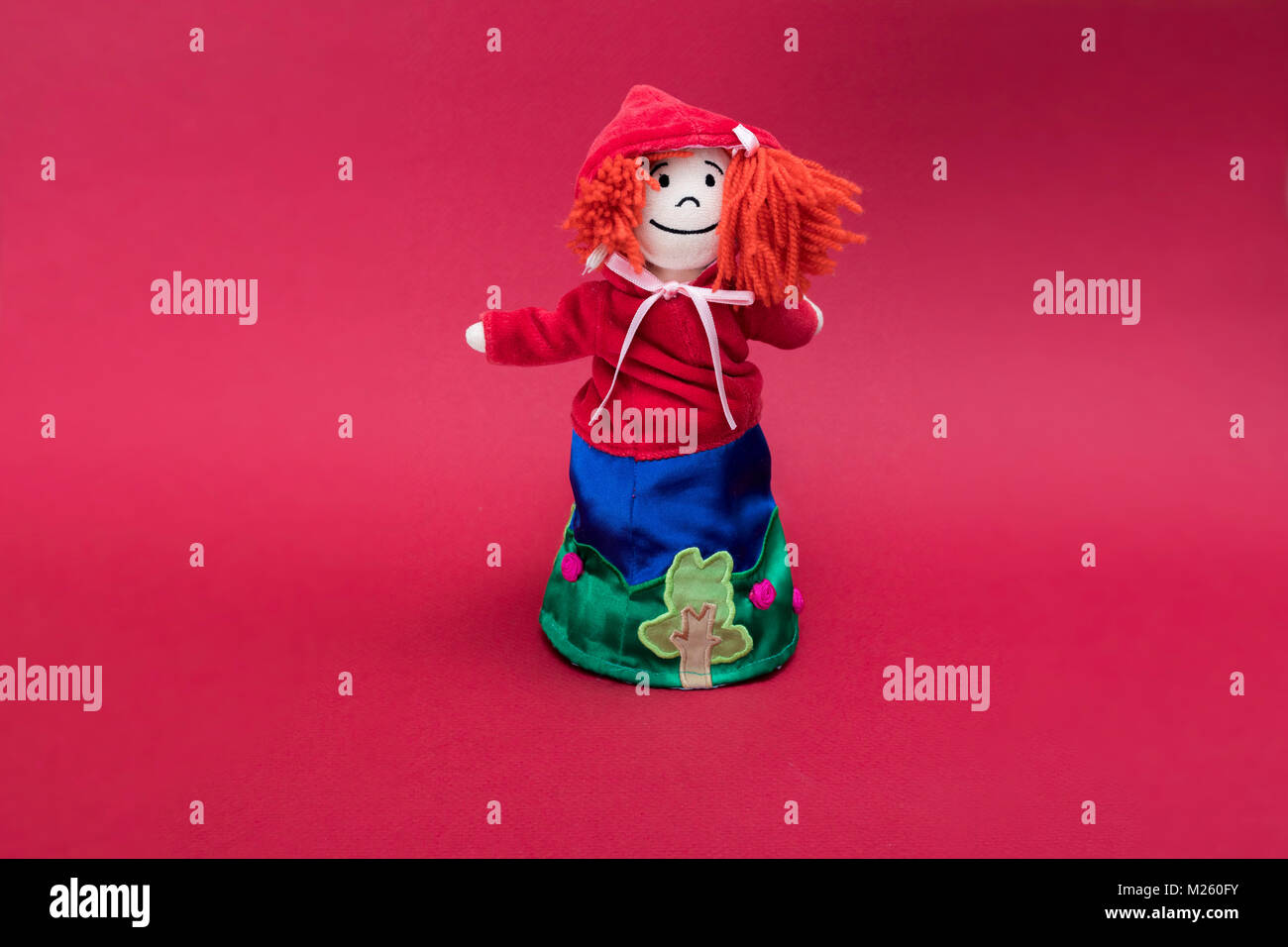 Little red riding hood smiling and cute female or girl rag or fabric ...