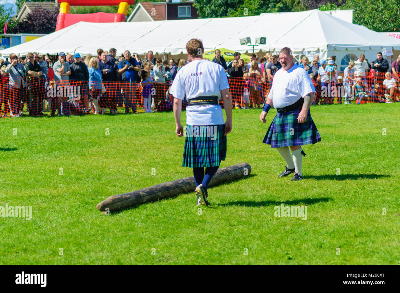 Male prepares to compete in tossing the caber competition at the ...