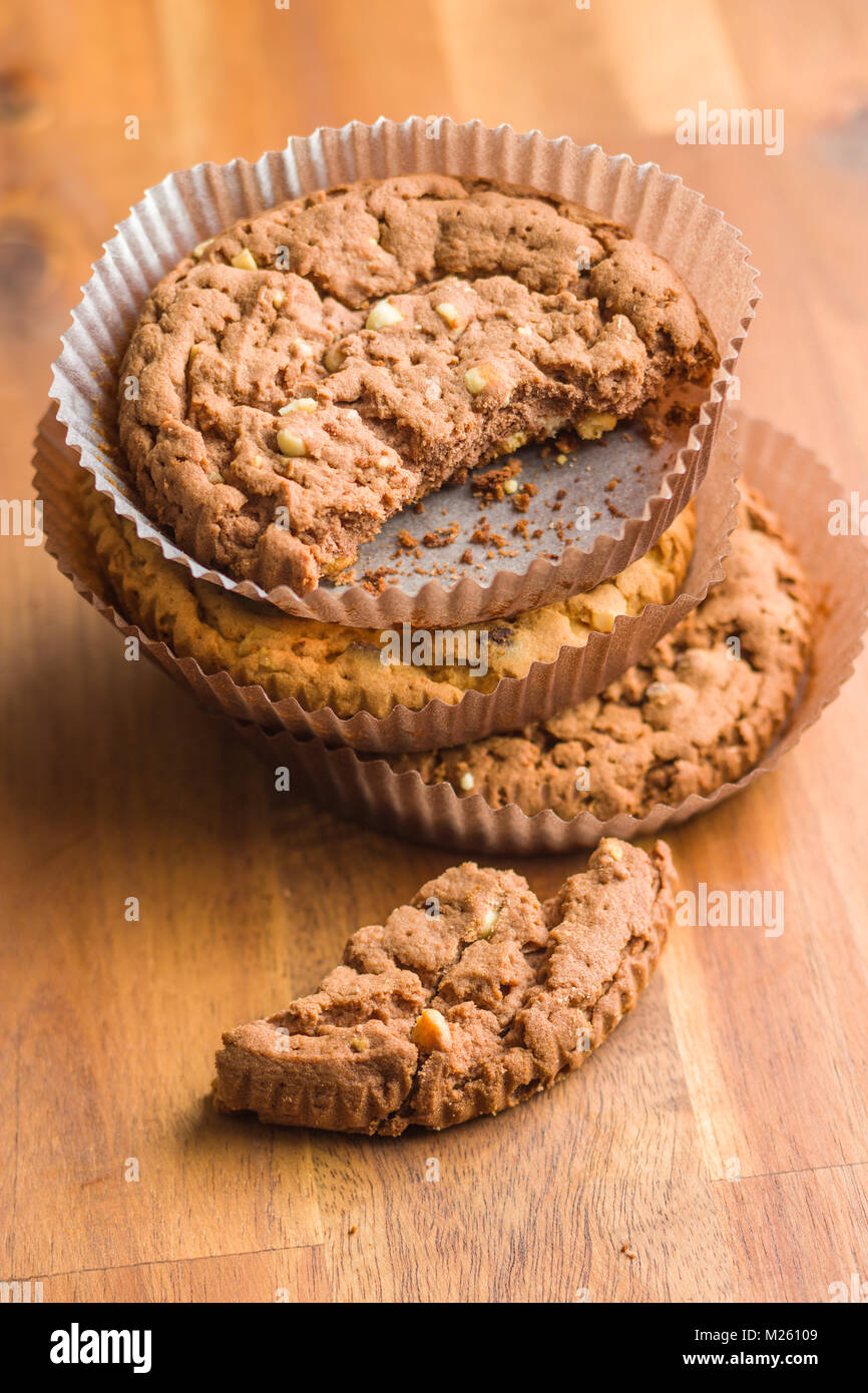 Sweet chocolate cookies on wooden table Stock Photo - Alamy