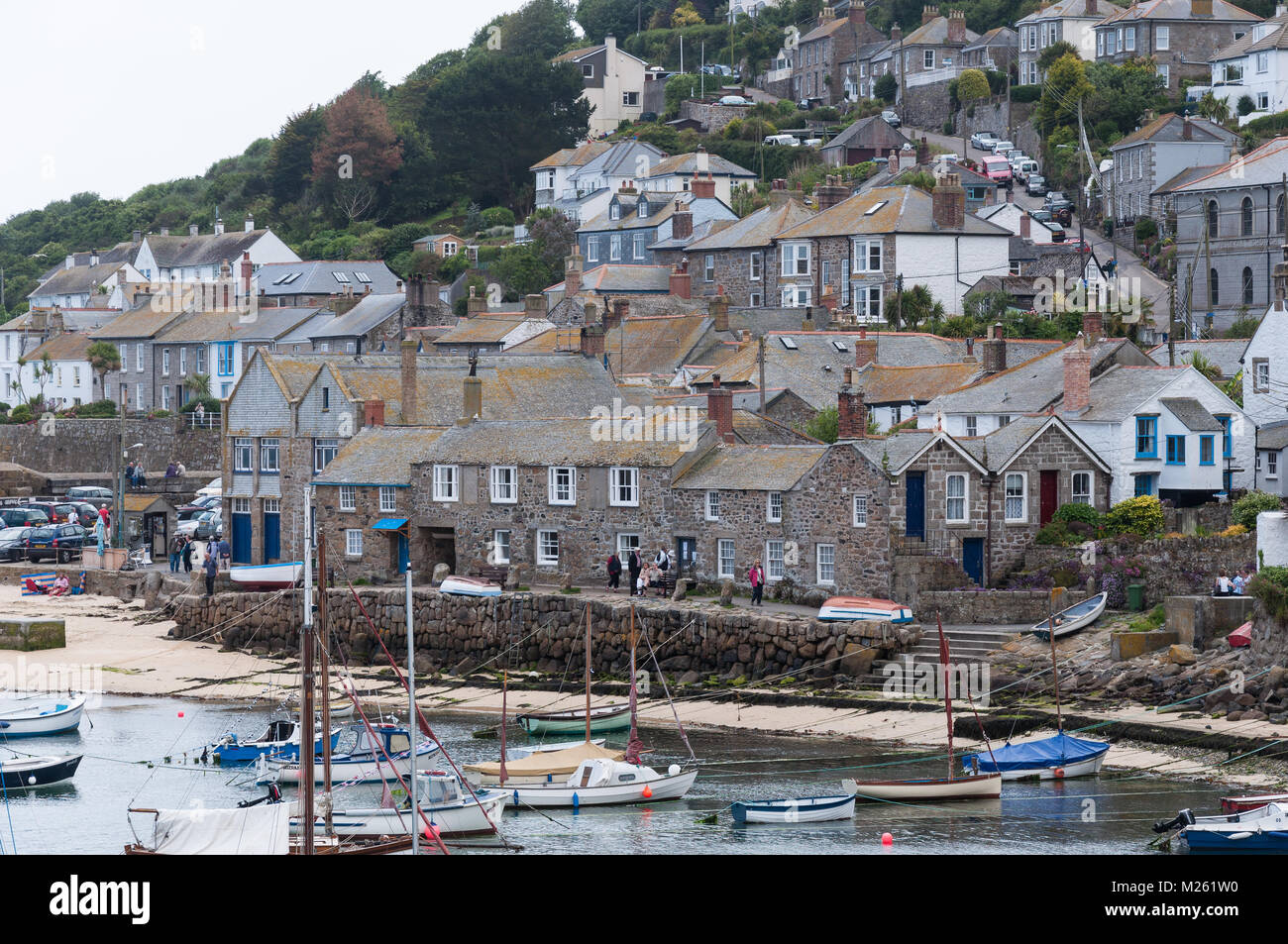 The harbour and fishing village of Mousehole, Cornwall, England, UK ...