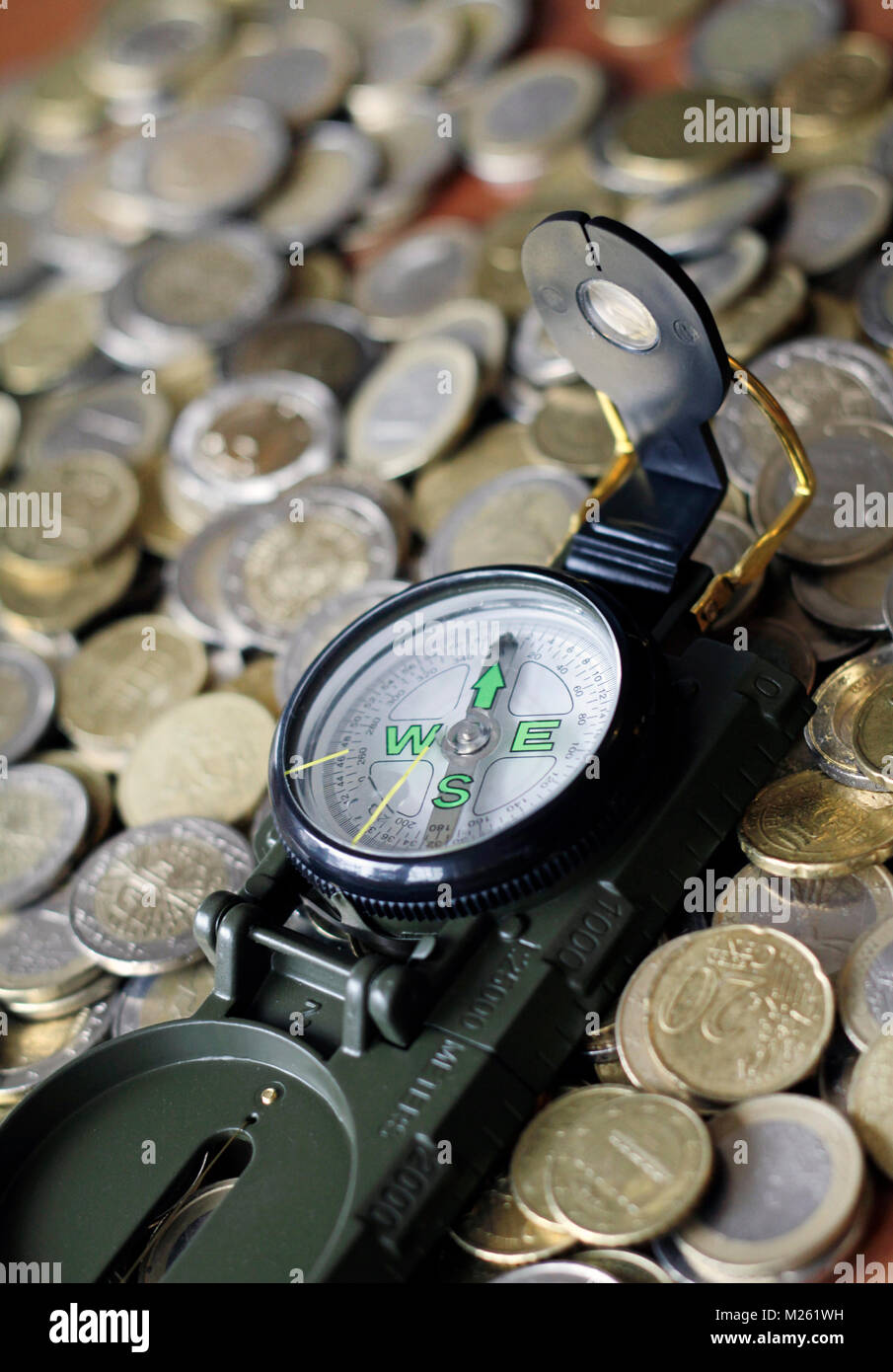 Compass money hi-res stock photography and images - Alamy