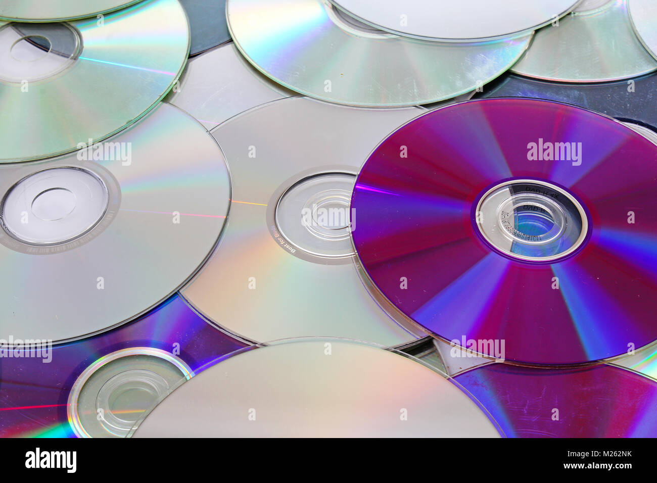 Cd,dvd reflective shiny cd dvds blue ray texture pattern. Close up ...