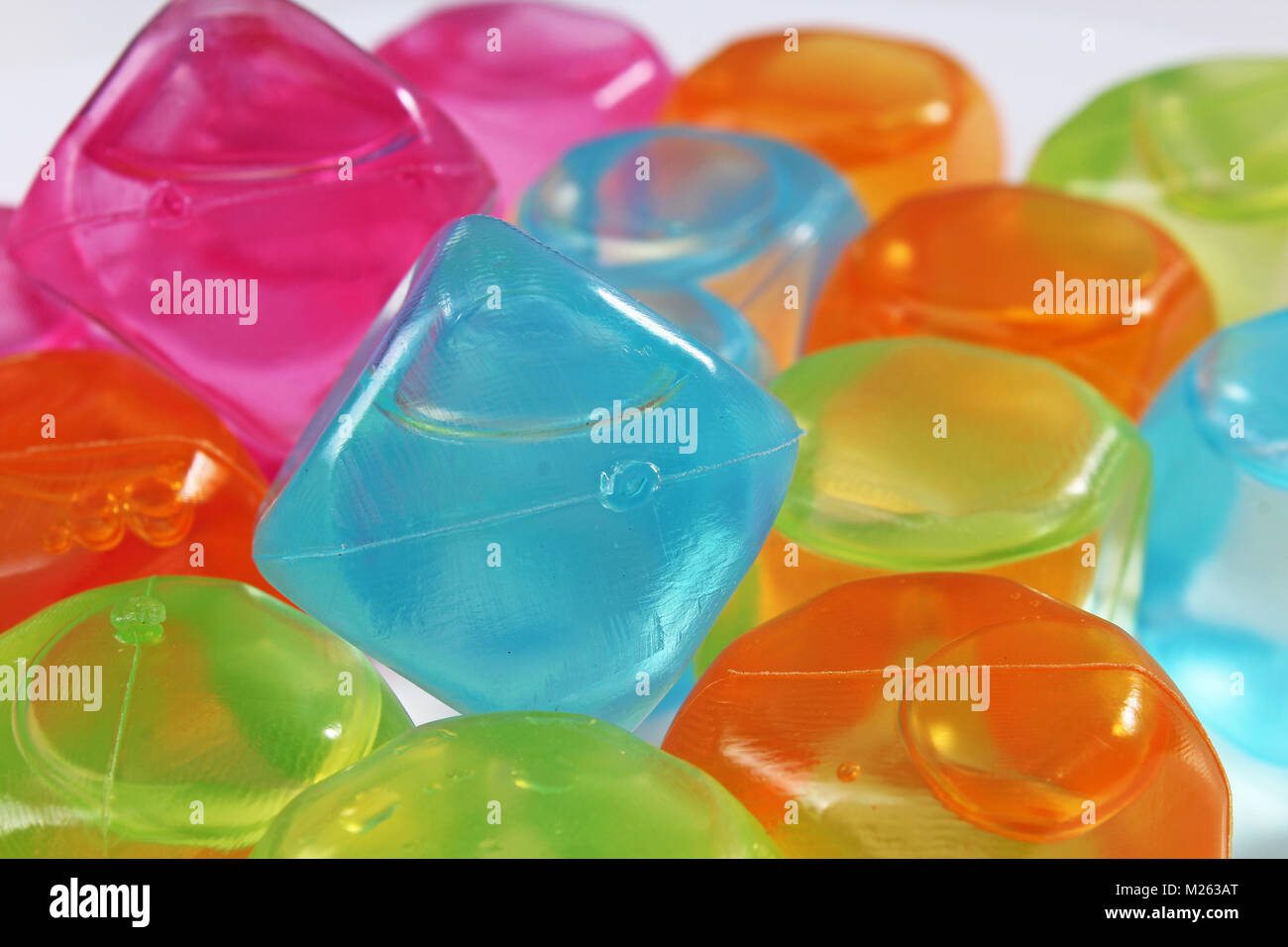 Colorful plastic ice cubes. Ice cubes as background. Photo Stock Photo ...