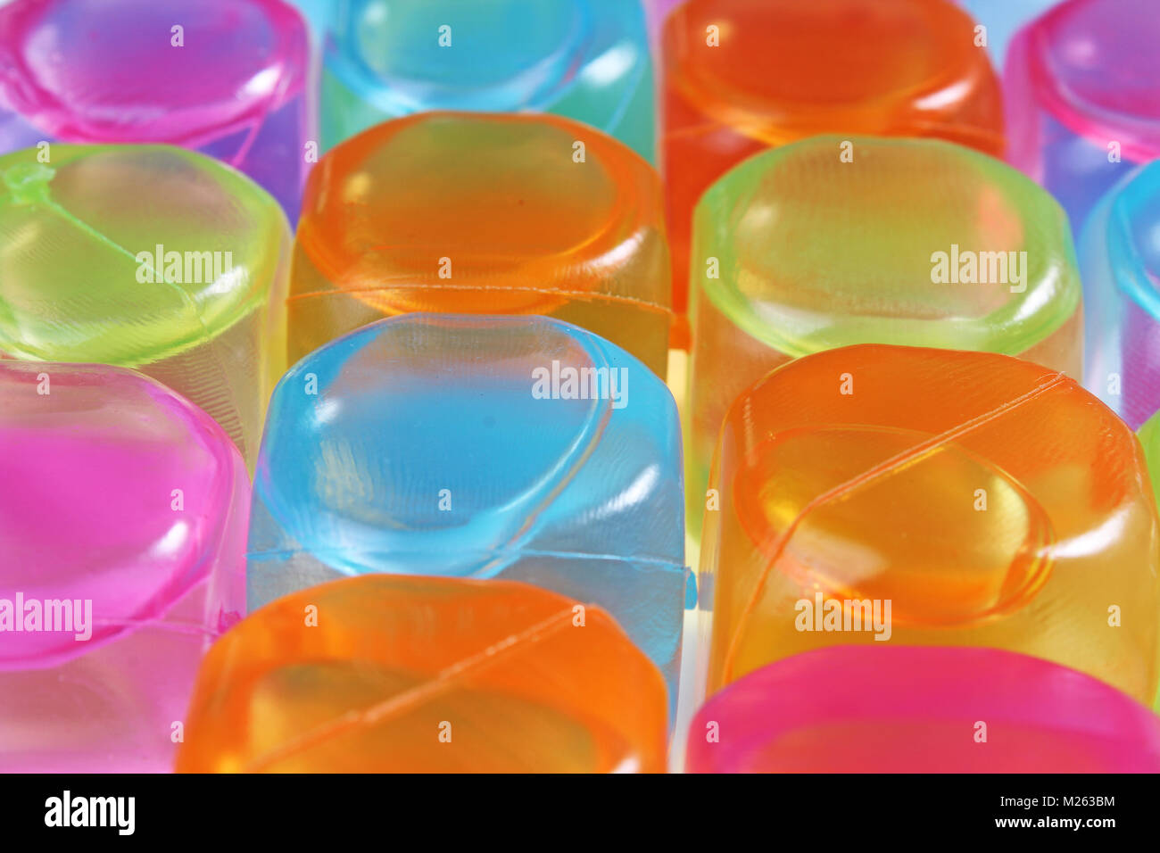 Colorful plastic ice cubes. Ice cubes as background. Photo Stock Photo ...