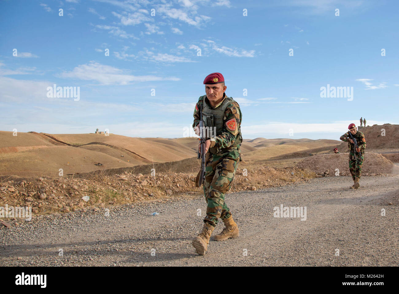Coalition partner force members pulls security during basic infantry ...