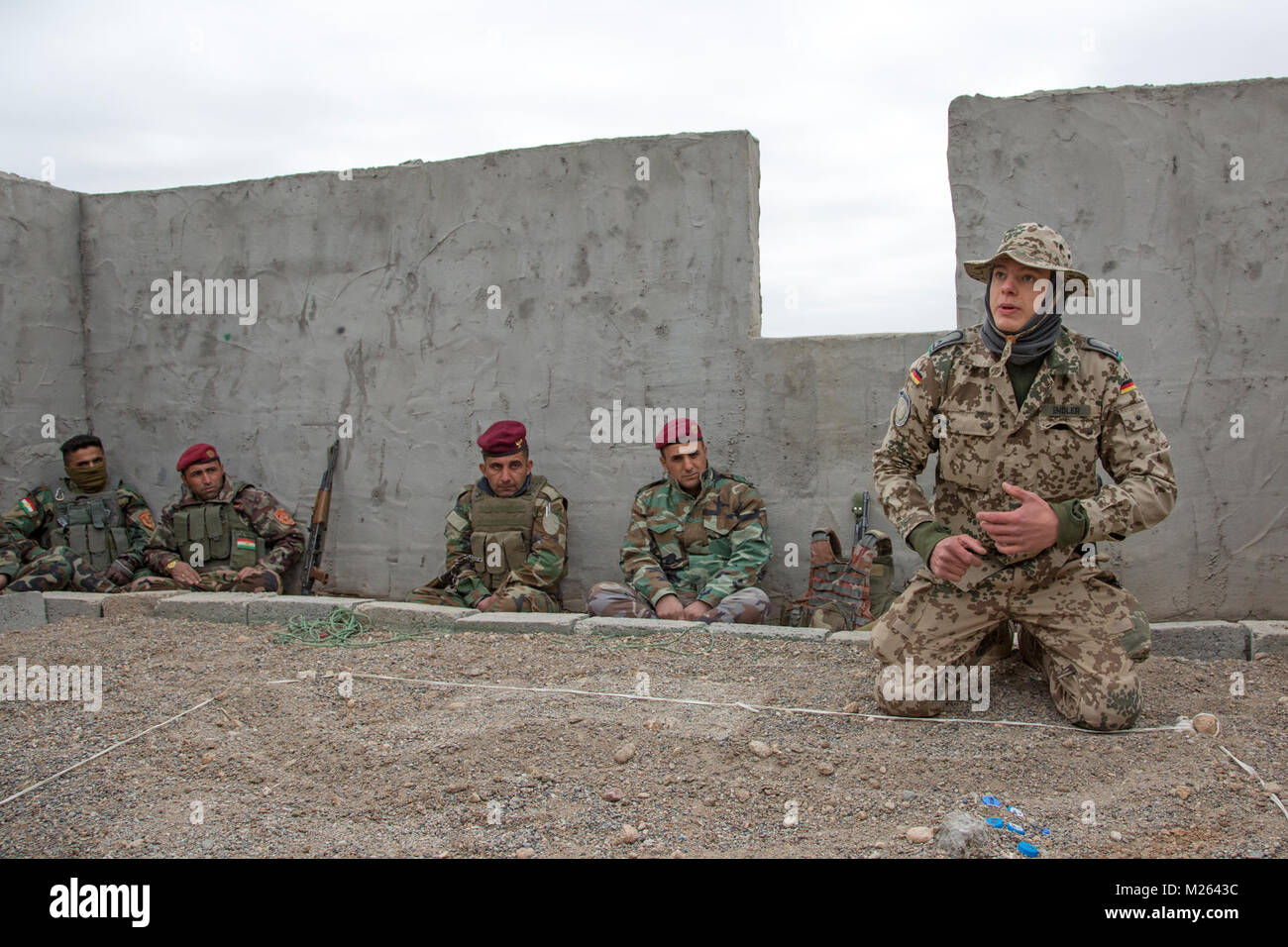A German army trainer gives instruction during counter improvised ...