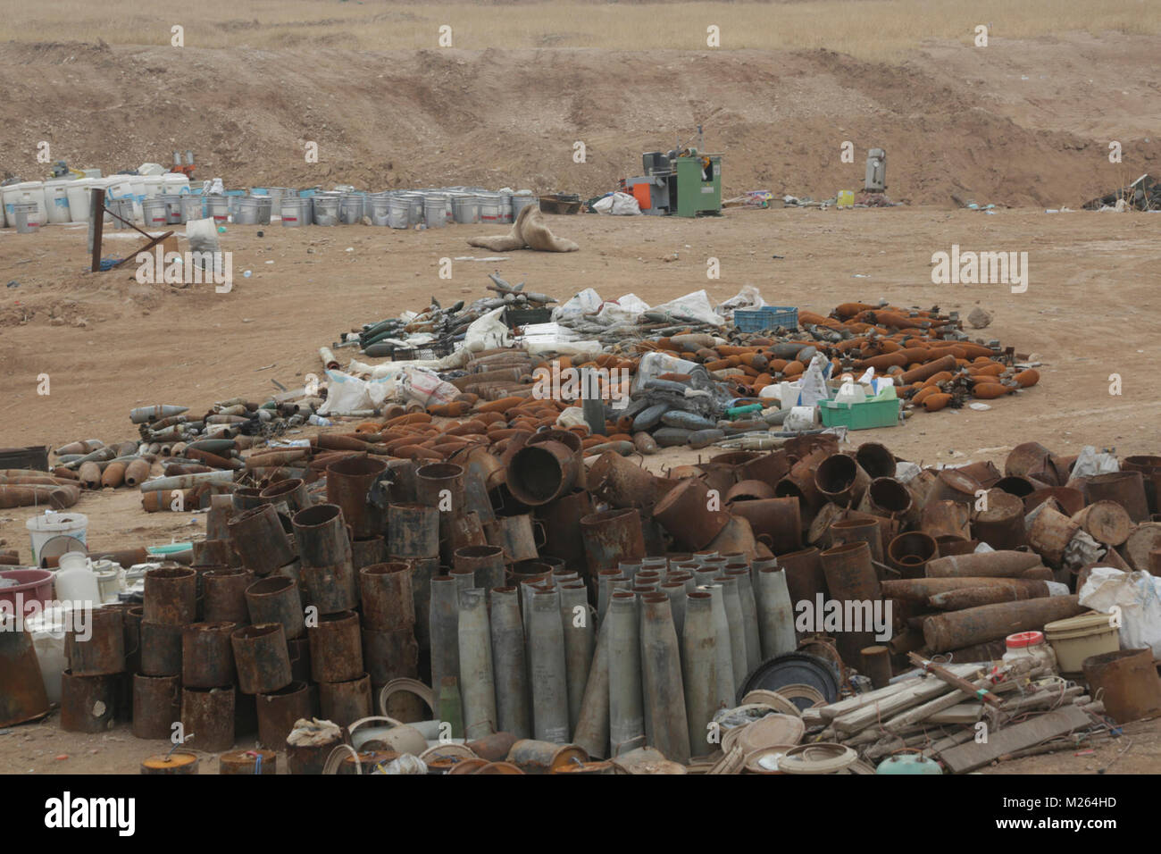 Improvised explosive devices sit at an unexploded ordinance device ...