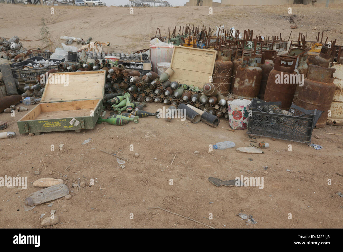 Improvised explosive devices sit at an unexploded ordinance device ...