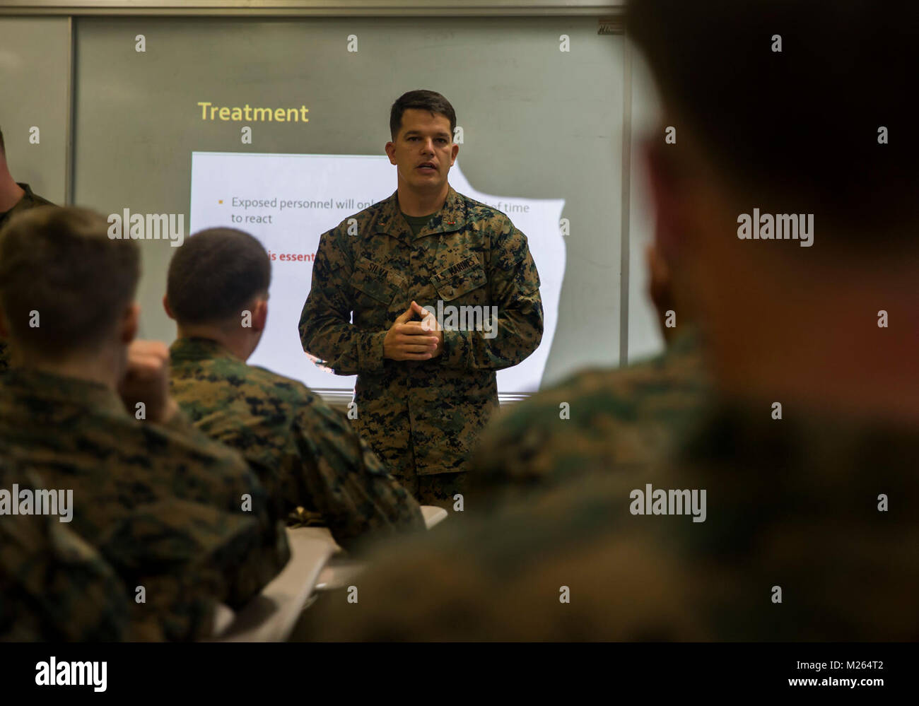 Warrant Officer Jonathan Silva talks to Marines during a reconnaissance ...