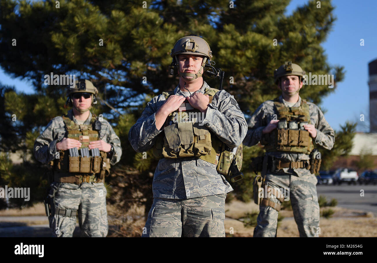 U.S. Air Force Staff Sgt. Eddie Fore, center, a Survival, Evasion ...