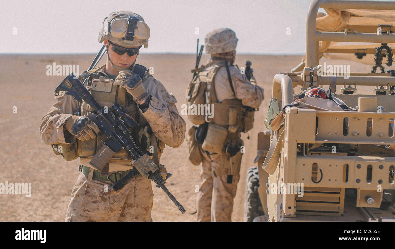 A U.S. Marine with Task Force Southwest observes the integrity of a ...