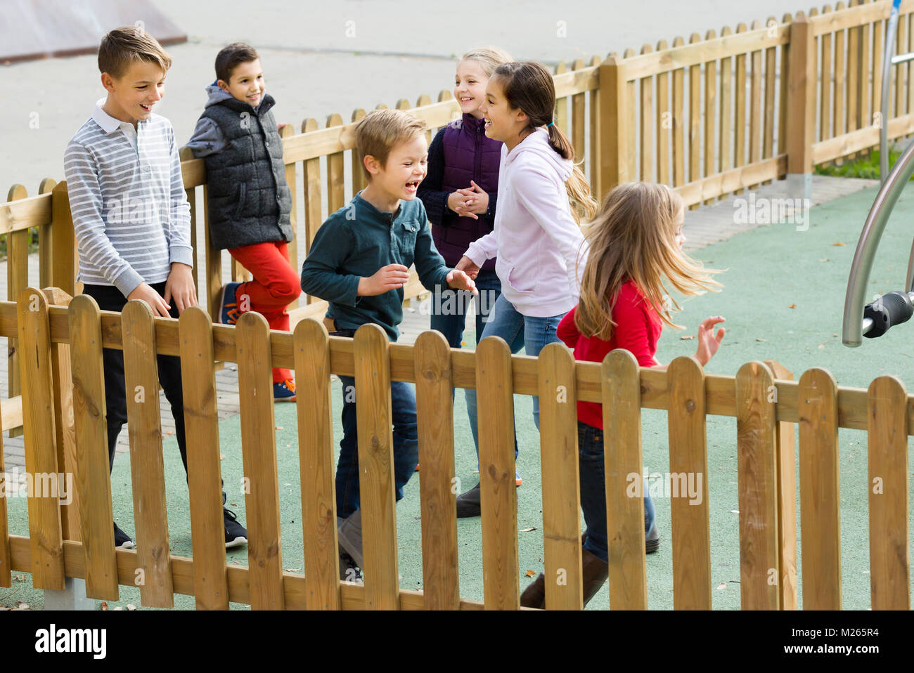 Children playing romp game Touch-last at outdoor Stock Photo - Alamy