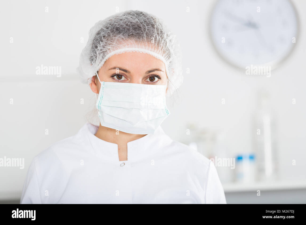 Young female nurse ready to receive patients in hospital Stock Photo ...