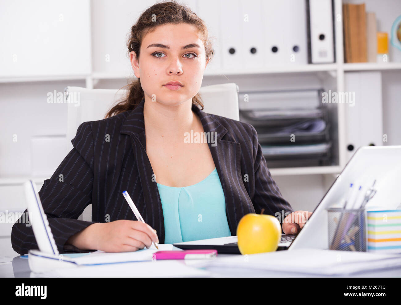 Beginner is having productive day at work in office Stock Photo - Alamy