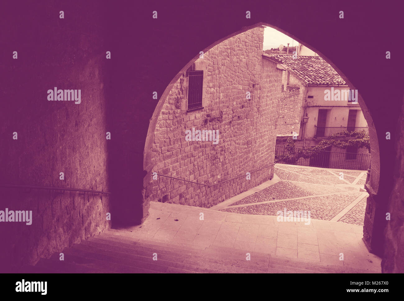 Street with arch in Calaceite. Aragon Stock Photo - Alamy