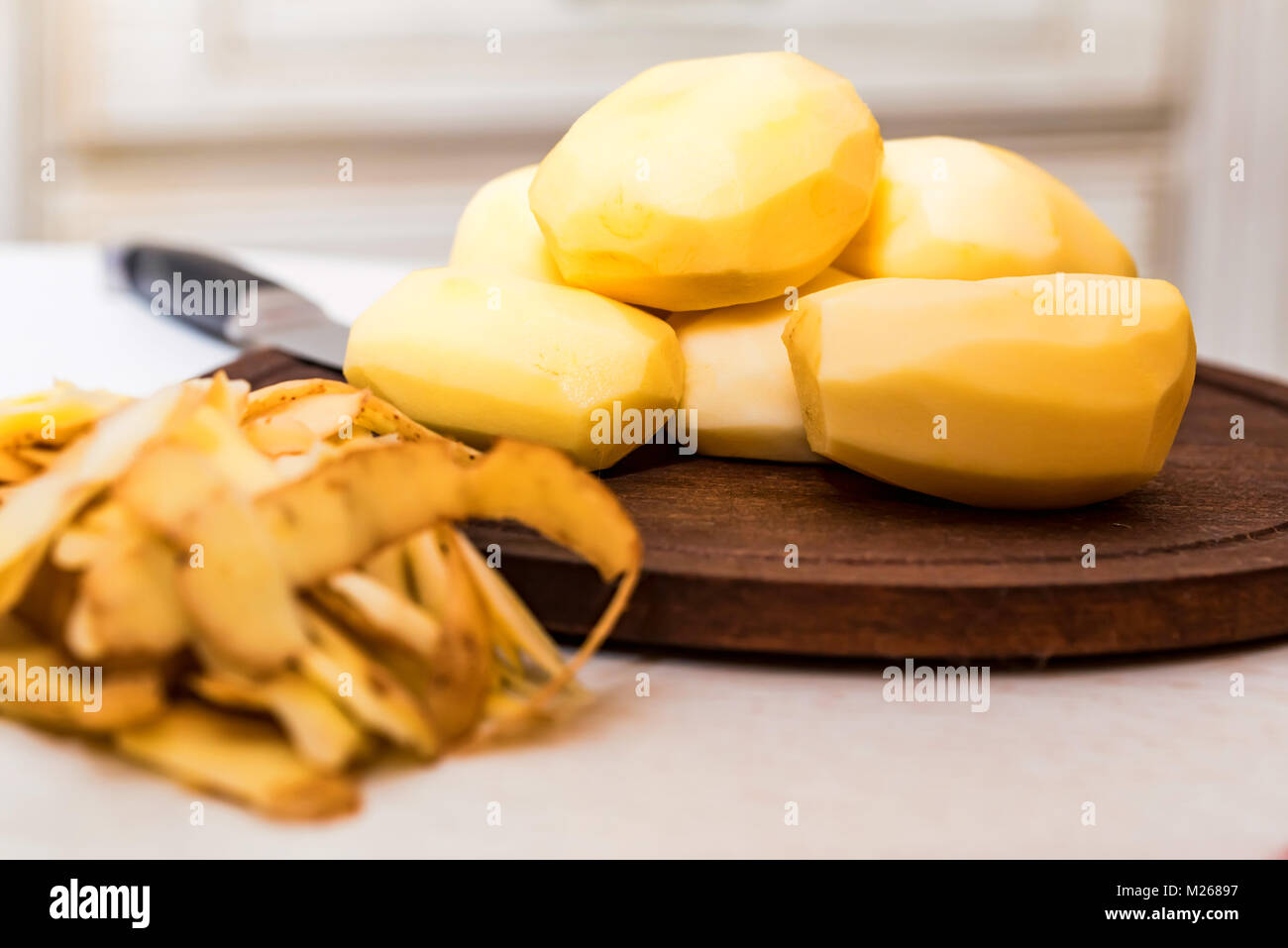 Cook peels potatoes healthy food hi-res stock photography and images ...