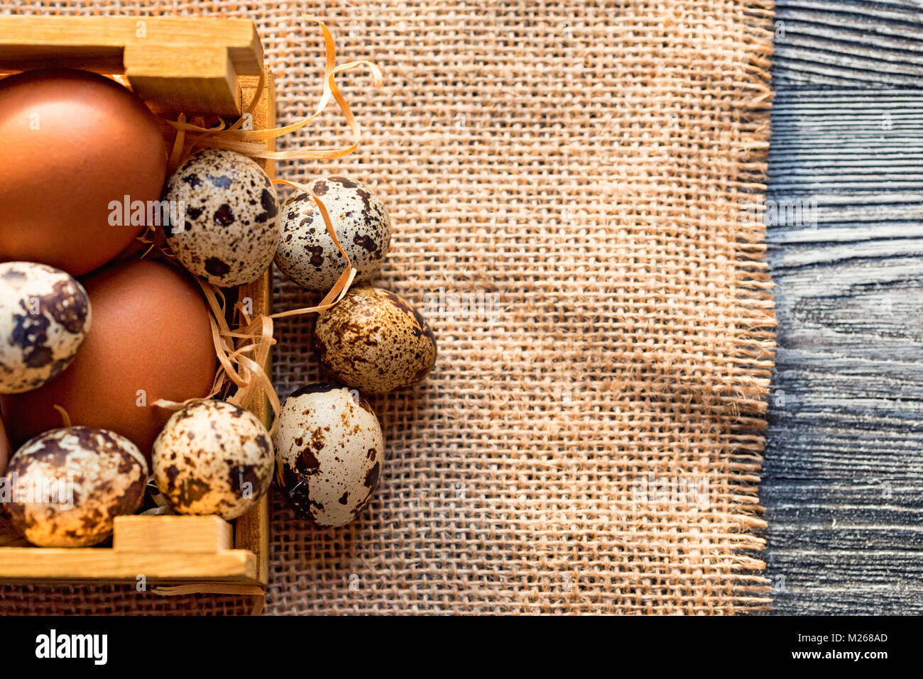 Fresh farm brown eggs on rustic background Stock Photo - Alamy