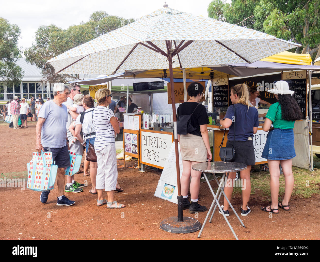 People walking and browsing at the outdoor markets in Margaret River ...