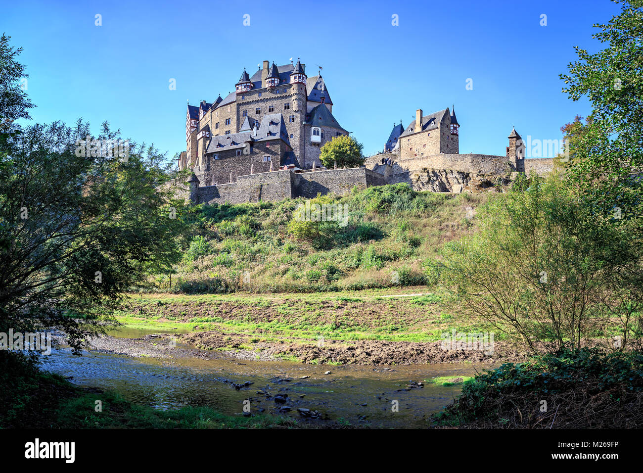 The Eltz Castle, a medieval castle in the hills above the Moselle River ...