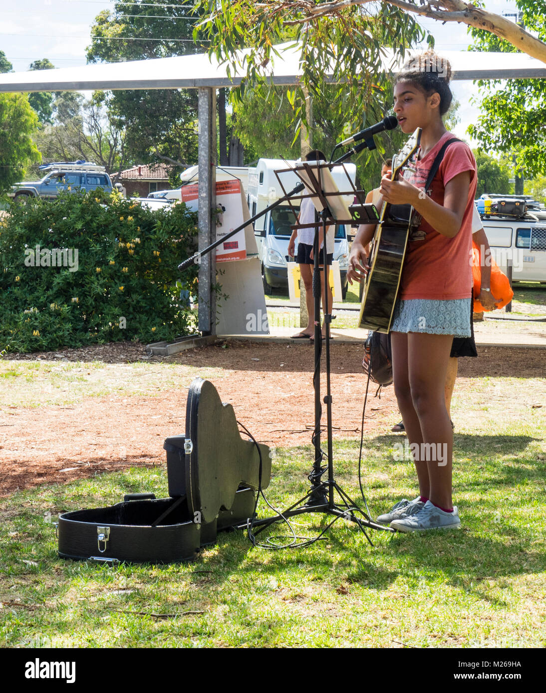 Female singing busker hi-res stock photography and images - Alamy