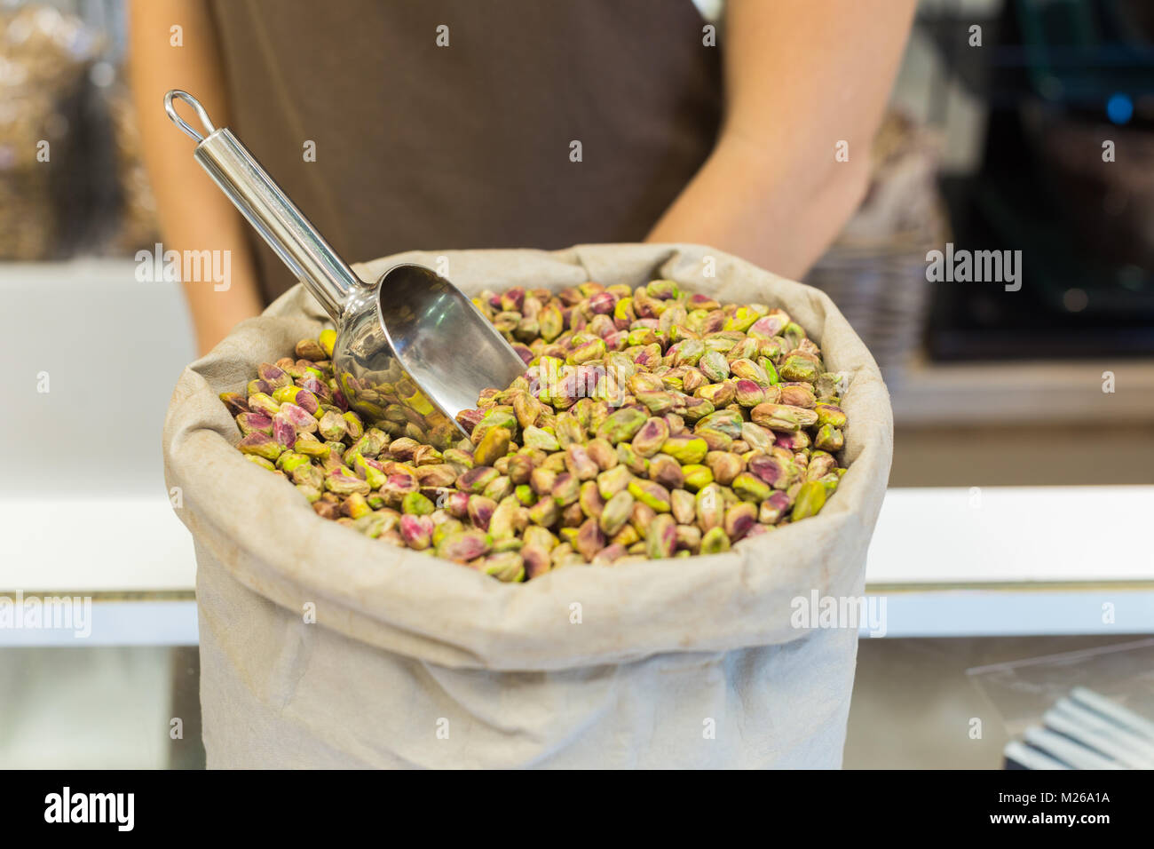 Photo of mix pistachios in the food store Stock Photo - Alamy