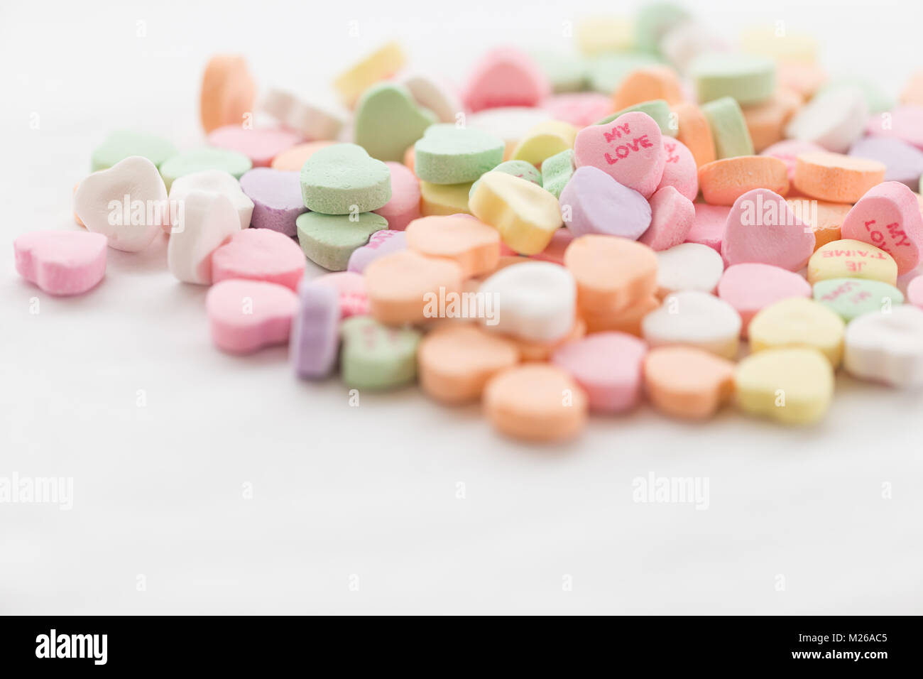 Valentine conversation hearts candy hi-res stock photography and images ...