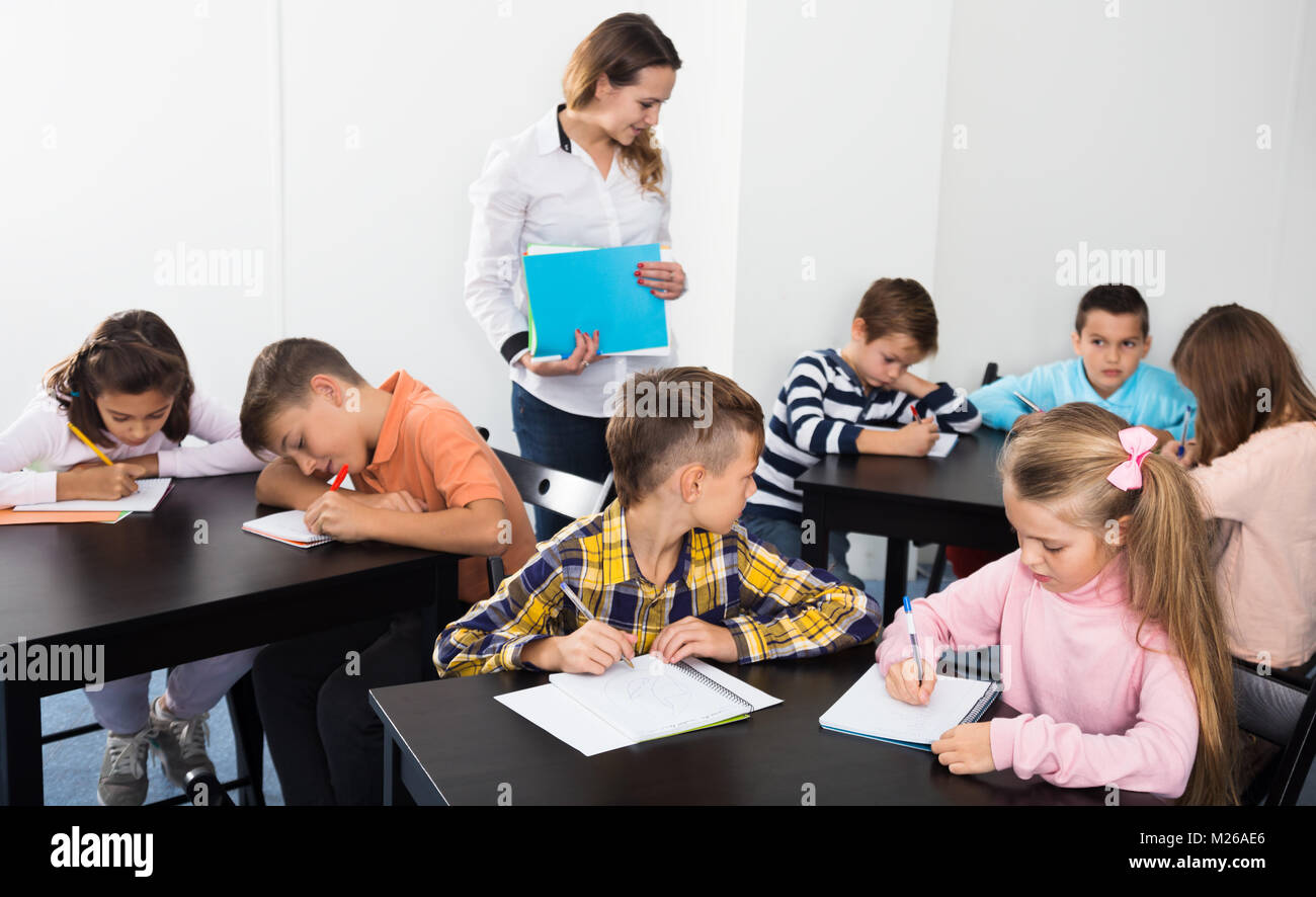 Little children with their teacher in a classroom at school Stock Photo ...