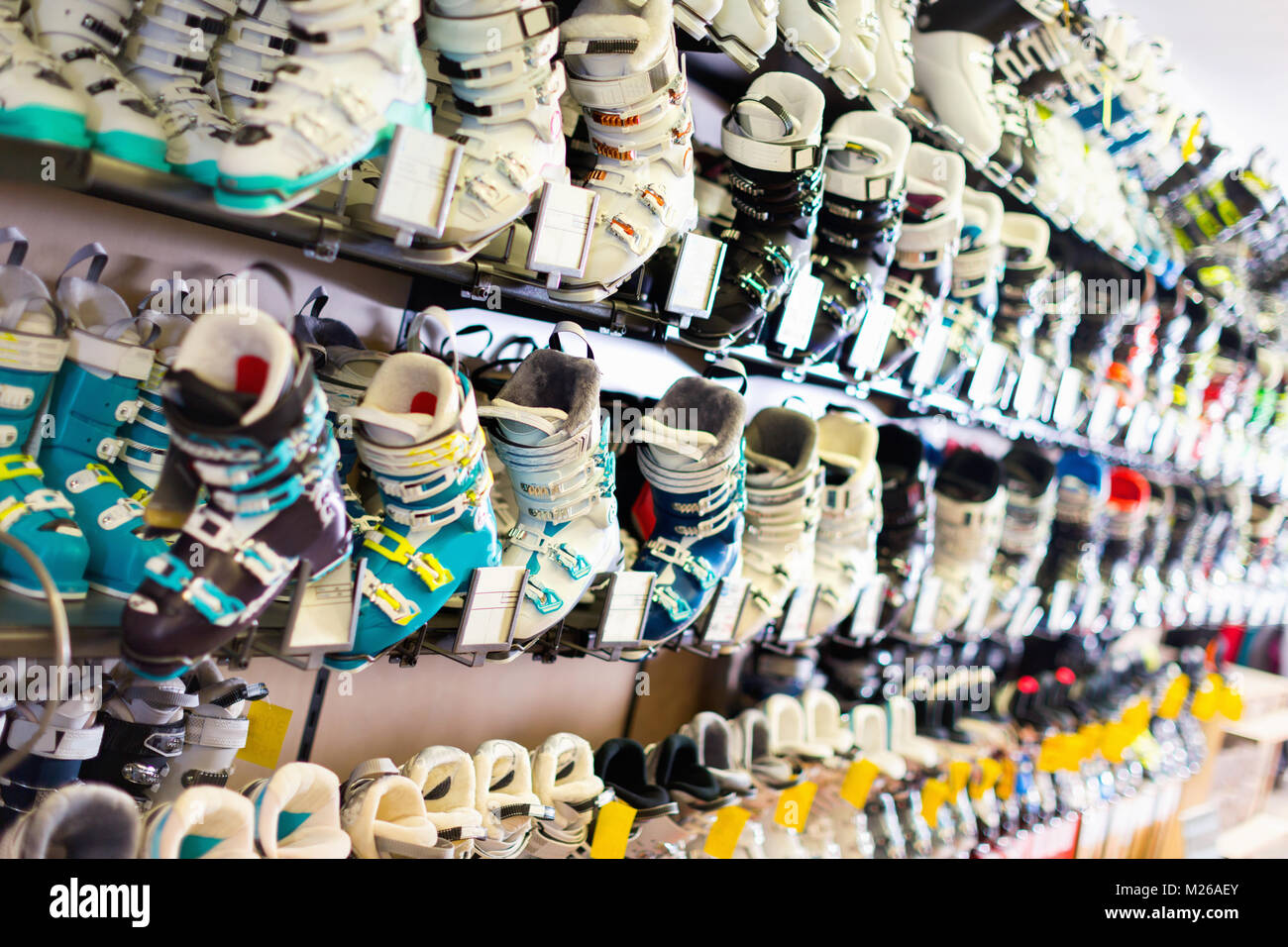 Image of boots for skiing on shelves of ski store Stock Photo - Alamy