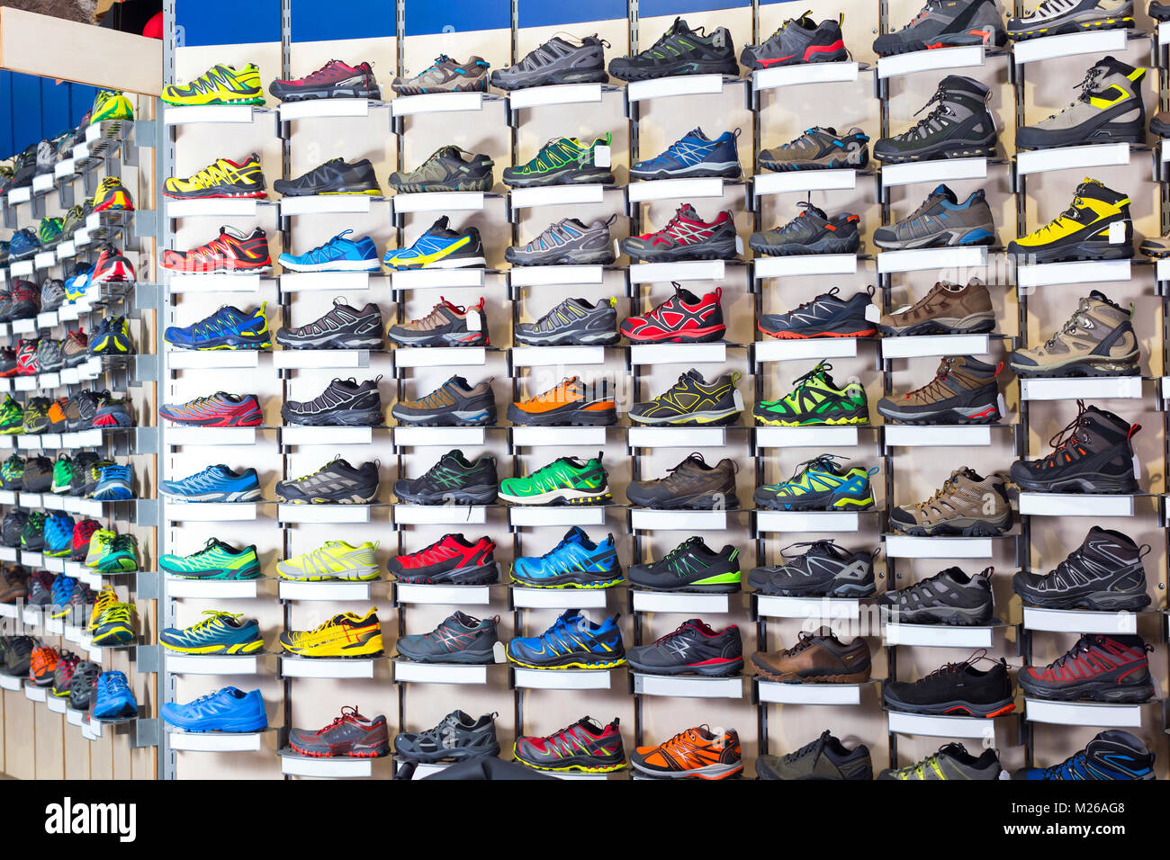 Image of shelves of the shop with sneakers Stock Photo - Alamy